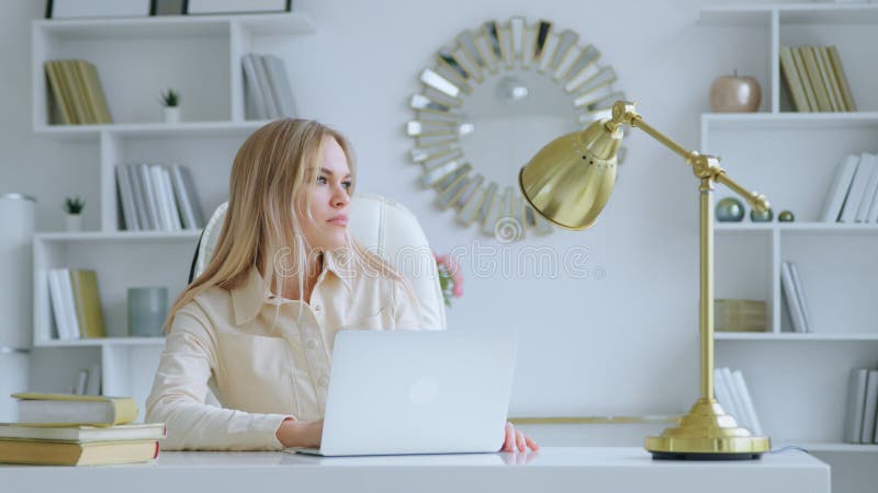 Thinking Young Girl at the Desk with a Laptop Stock Photo - Image of ...