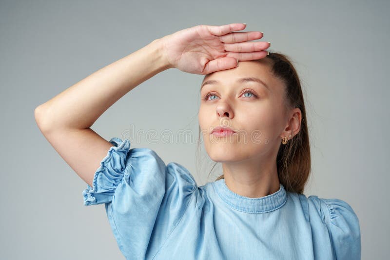 Thinking Young Lady Standing Over Gray Background Close Up Stock Image ...