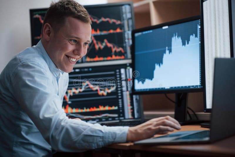 Thinks What To Do Next. Man Working Online in the Office with Multiple ...