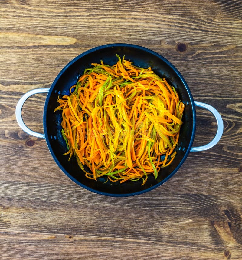 Thinly Cut Thin Strips of Carrots. Fried and Stewed Carrot Spaghetti in ...