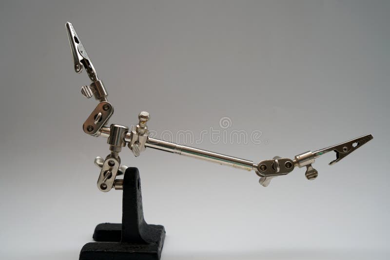 Third Hand Tool on a Gray Background Stock Photo - Image of control ...
