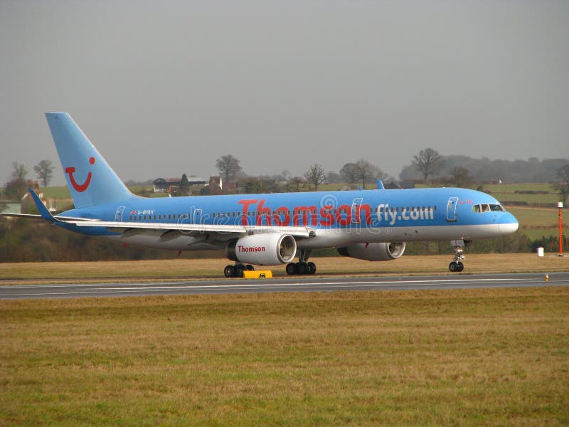 Thomsonfly airlines plane editorial photography. Image of waiting ...