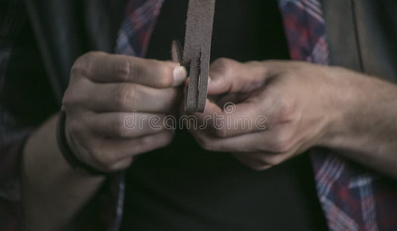 Close Up of Piece of Leather in Man Hands Leather Worker Cuts into Thin ...