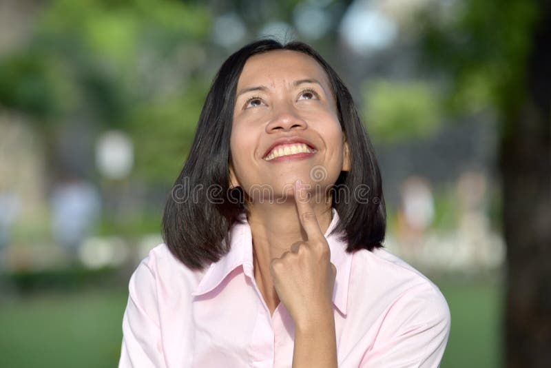 A Thoughtful Adult Female stock image. Image of thought - 154646069