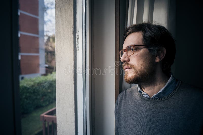 Thoughtful Anxious Guy Looking Out the Window Stock Photo - Image of ...