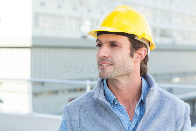 Thoughtful Architect Wearing Yellow Hard Hat Stock Photo - Image of ...