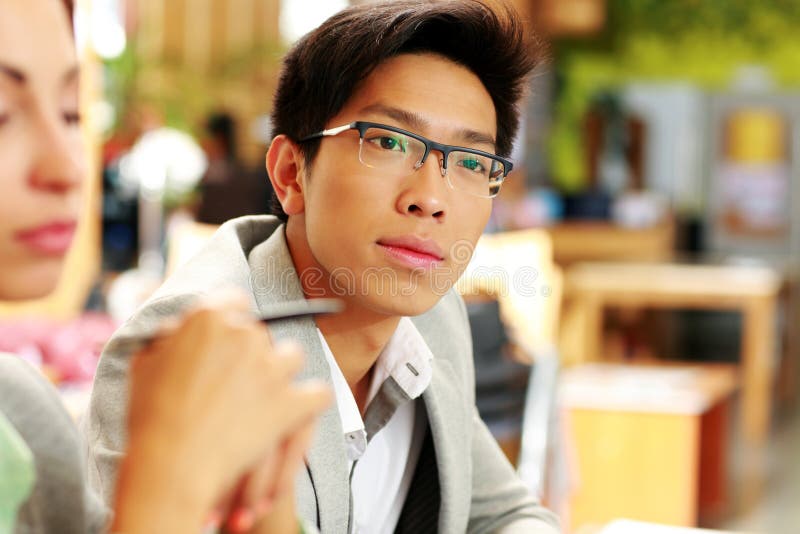 Thoughtful Asian Man in Glasses at Office Stock Photo - Image of face ... Thoughtful Asian Man in Glasses at Office Stock Photo - Image of face ...