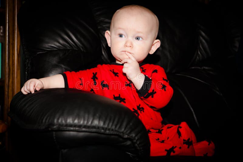 Thoughtful Baby stock photo. Image of male, bald, onsie - 48237686