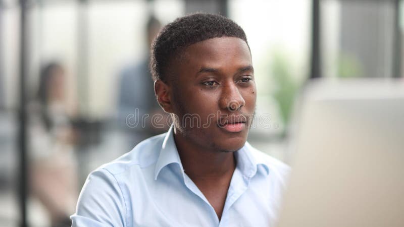 Thoughtful Black Man in Eyeglasses Stack with Hard Task, Looking at ...