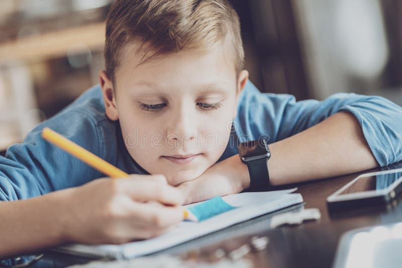 Thoughtful Blonde Kid Writing Task Stock Photo - Image of comfort ...