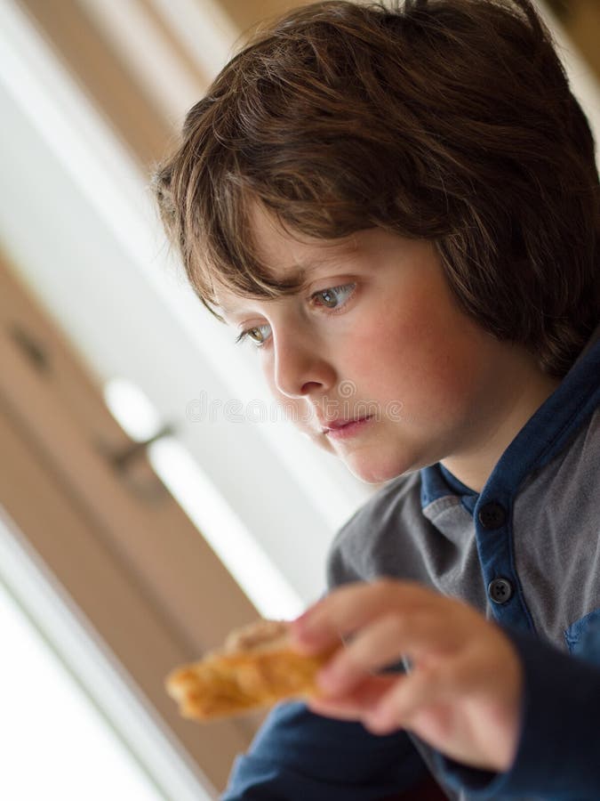 Boy eating a toast stock image. Image of caucasian, child - 30243035