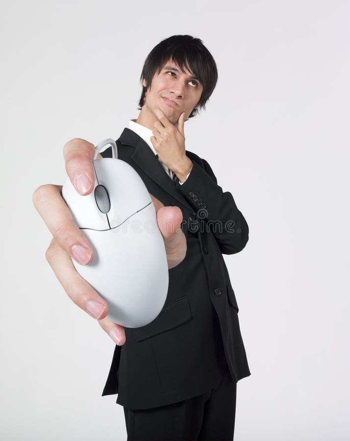 Thoughtful Businessman Holding Mouse Computer Stock Photo - Image of ...