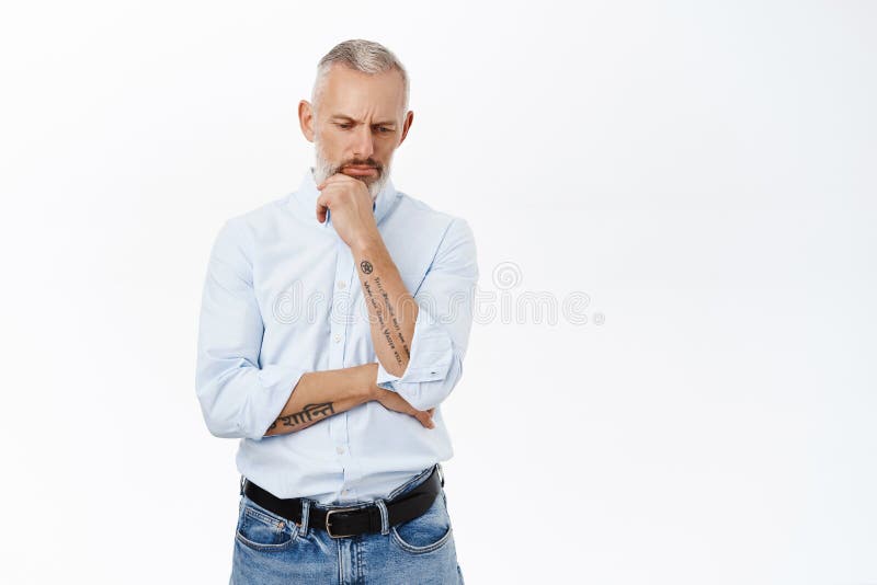 Thoughtful Businessman Looking Down and Thinking, Pondering with ...