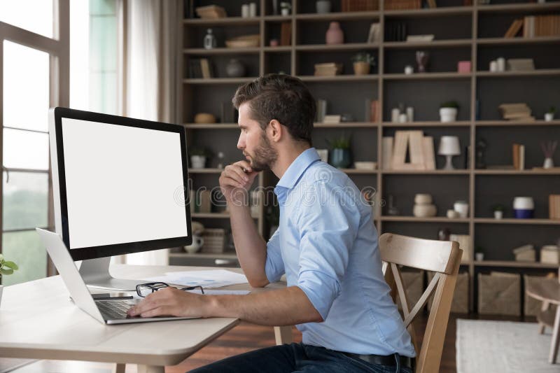 Focused Young Businessman Working at Laptop Computer Stock Image ...