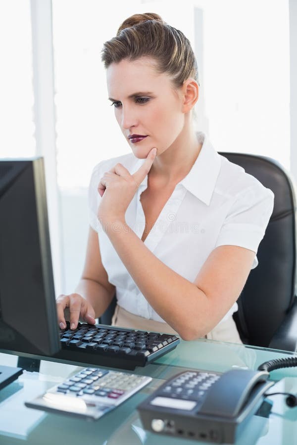 Thoughtful Businesswoman Working on Computer Stock Photo - Image of ...