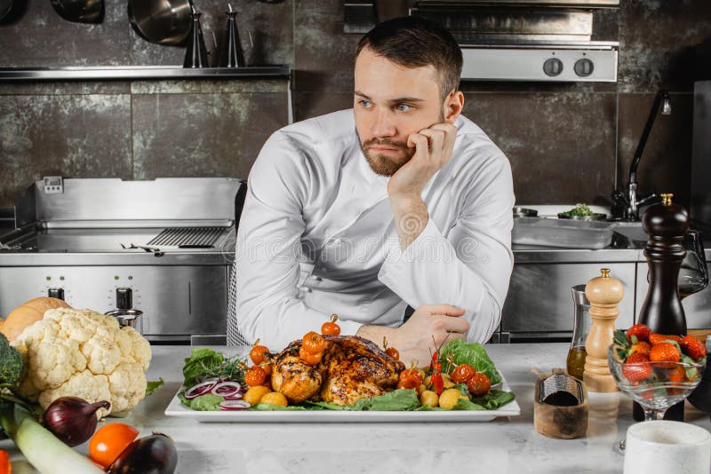 Thoughtful Chef in Red Uniform Restaurant Cook Readily Providing Dish ...