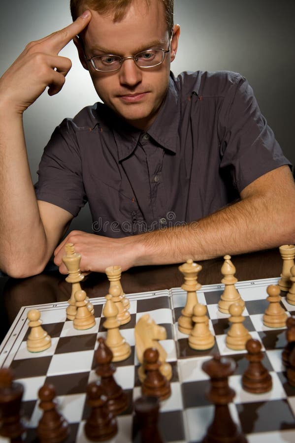 Thoughtful chess master stock image. Image of chessboard - 10891429