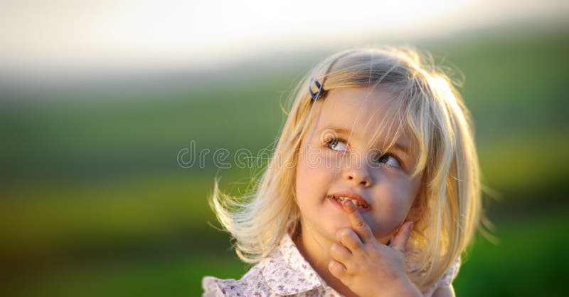 Thoughtful child stock photo. Image of girl, gorgeous - 15141796