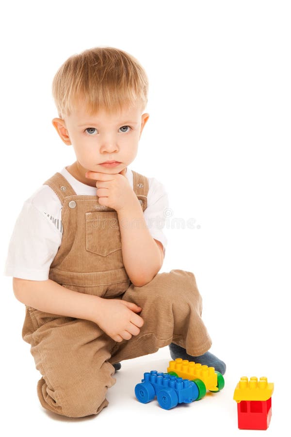 Thoughtful Child Playing with Toys Isolated Stock Image - Image of ...