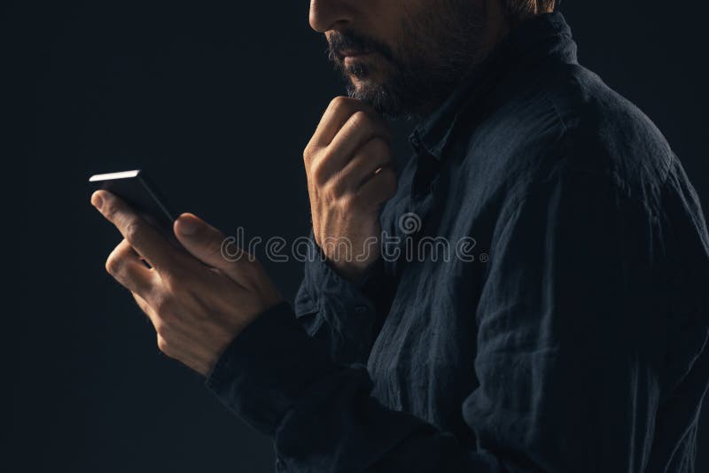 Thoughtful Concerned Man is Reading Text Message Stock Photo - Image of ...
