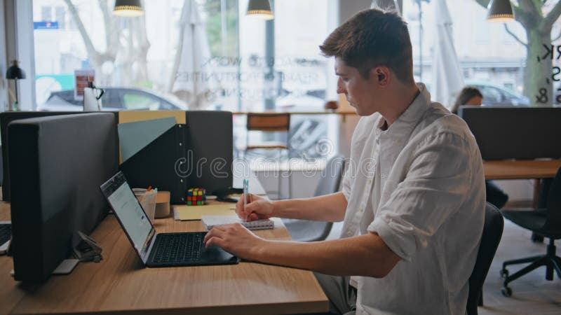 Thoughtful Creator Staring Laptop in Office Interior Closeup. Man ...