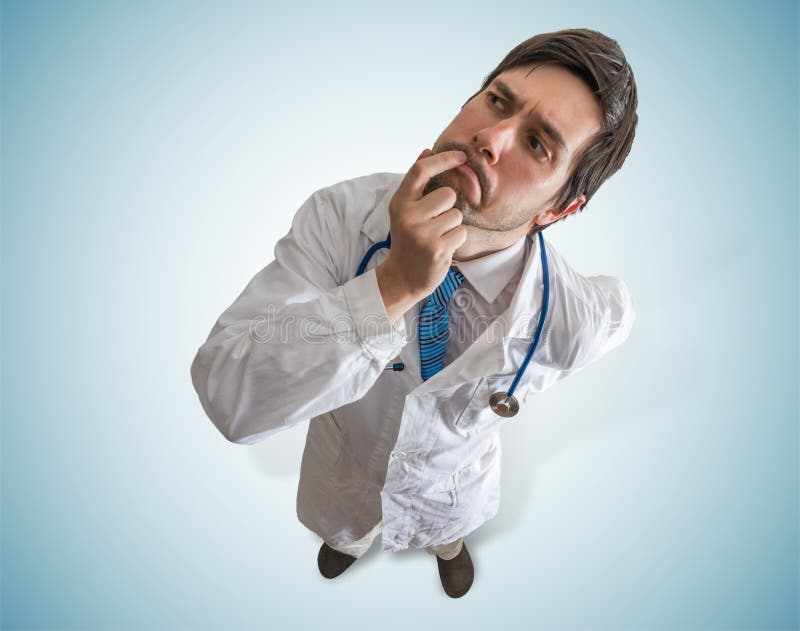 Thoughtful Doctor is Thinking and Solving a Problem. View from Top ...
