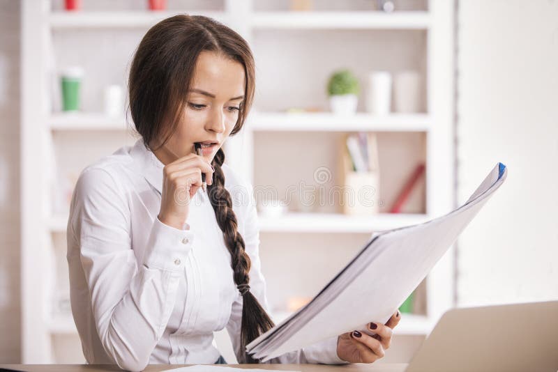 Thoughtful Female Doing Paperwork Stock Photo - Image of adult ...