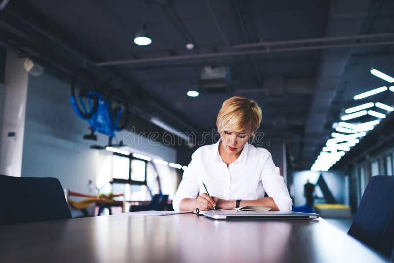 Concentrated Woman Secretary Taking Notes during Work Stock Image ...