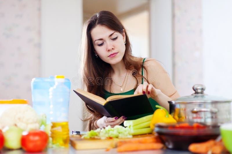 Thoughtful Girl Cooking with Cookbook Stock Image - Image of cook ...