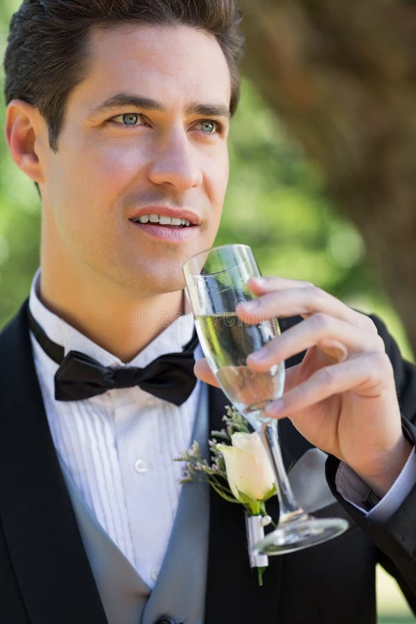Thoughtful Groom Drinking Champagne Stock Photo - Image of caucasian ...