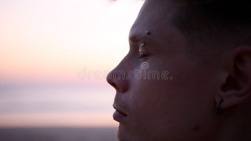 Thoughtful Guy on the Beach during Sunset Stock Photo - Image of ...