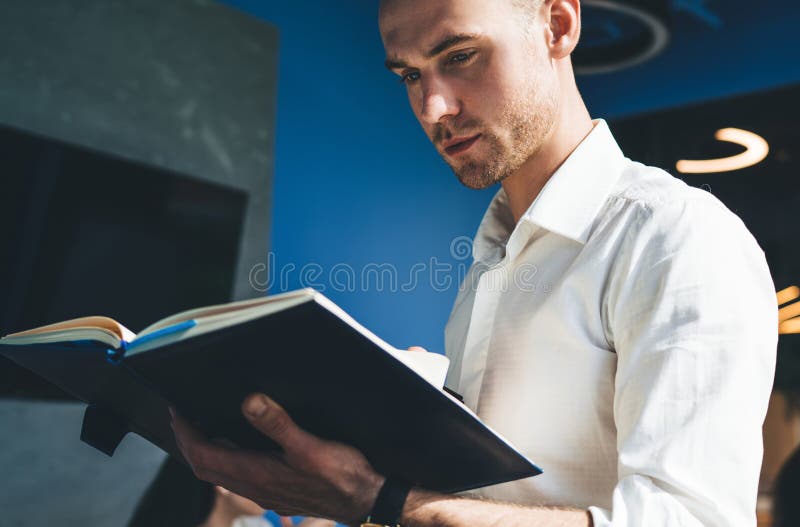 Thoughtful Guy Reading Report in Office Stock Image - Image of document ...