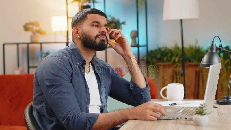 Thoughtful Indian Man Freelancer Thinking about an Important Creative ...