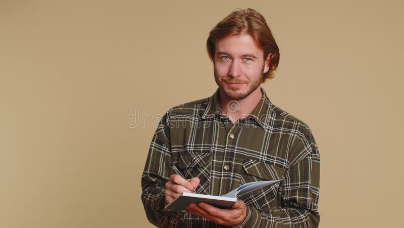 Thoughtful Journalist Man Making Notes, Writing Down Thoughts with Pen ...
