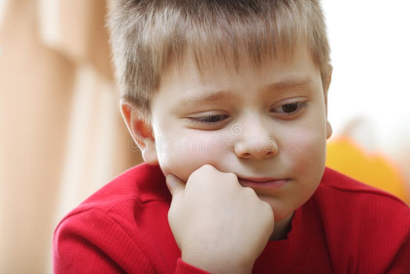 Thoughtful kid in red stock image. Image of thoughtful - 13578403