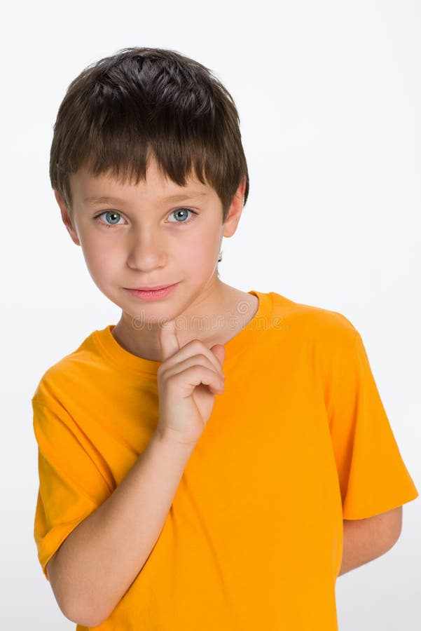 Cute Little Boy In Yellow Shirt Stock Photo - Image of portrait, indoor ...