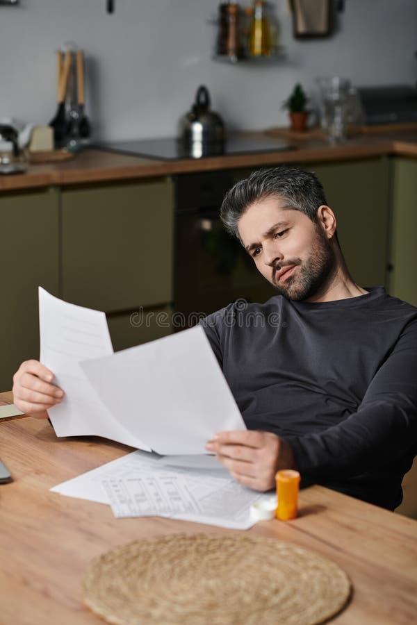 Thoughtful Man Reviews Important Documents Stock Photos - Free ...