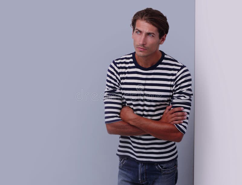 Thoughtful Man Standing in the Corner Stock Image - Image of facing ...