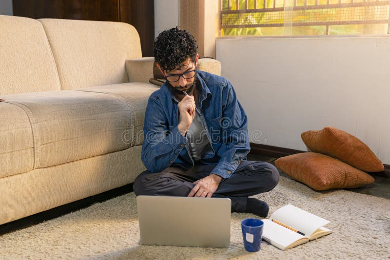 Thoughtful Man Trying To Solve Work Problems. Working from Home Concept ...