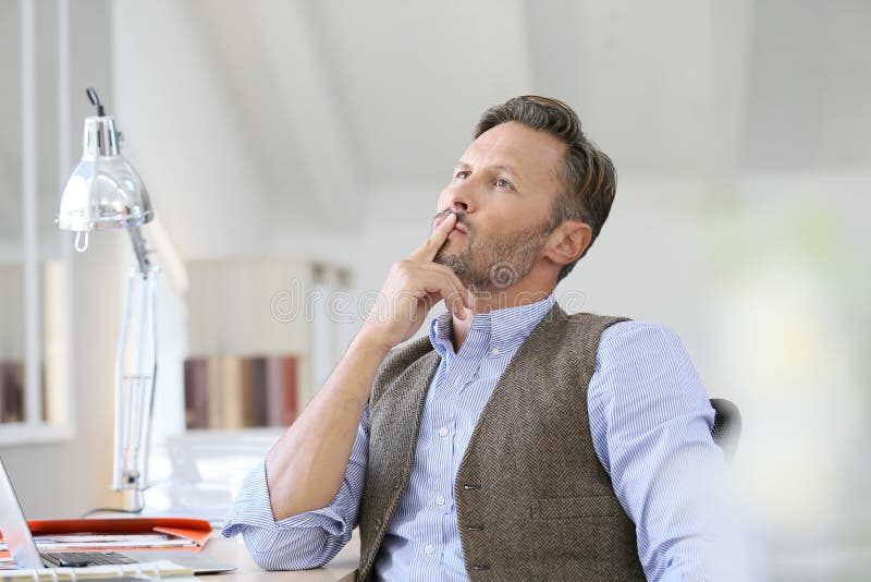 Thoughtful Man Working at Office Stock Image - Image of fashionable ...