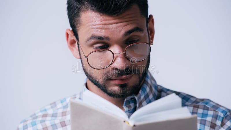 Thoughtful Nerd Student in Eyeglasses Reading Stock Photo - Image of ...