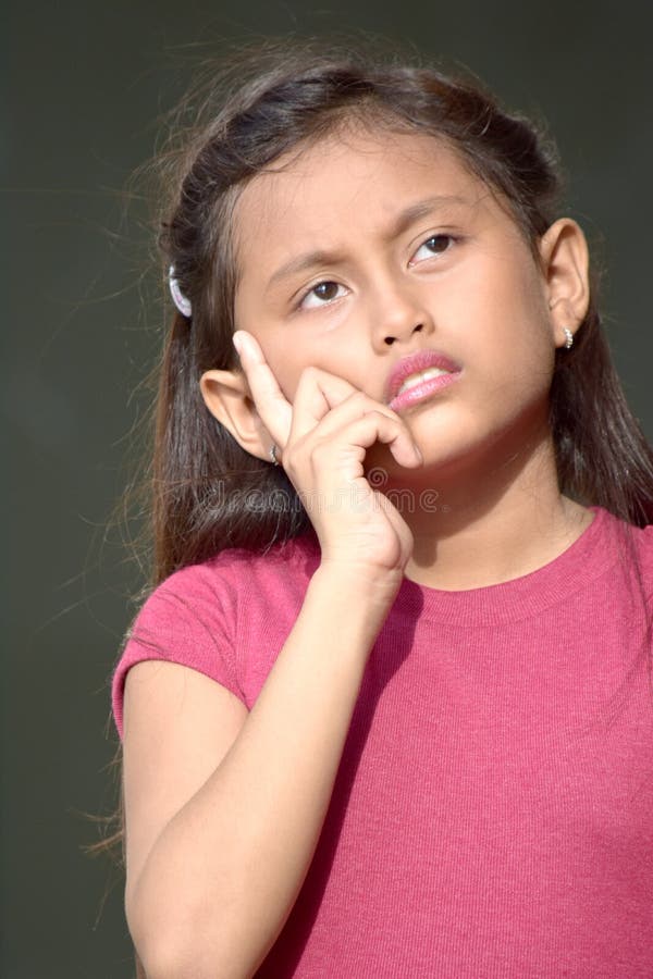 A Thoughtful Petite Female stock image. Image of thin - 136882985