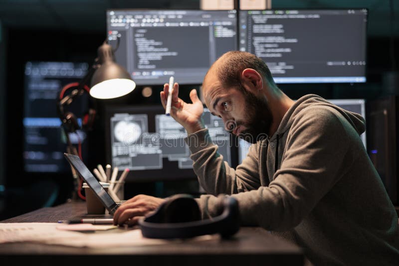 Thoughtful Programmer Brainstorming Ideas about Coding Stock Photo ... Thoughtful Programmer Brainstorming Ideas about Coding Stock Photo ...