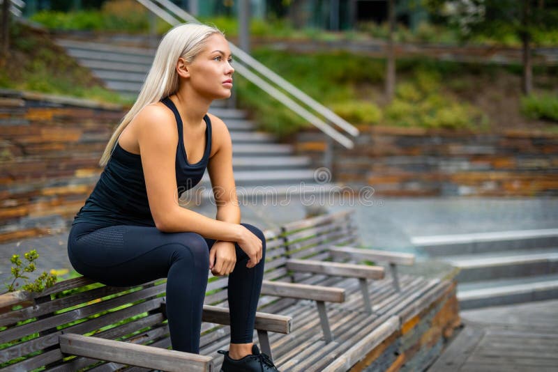 Thoughtful Runner Sitting on Bench after Workout Stock Image - Image of ...