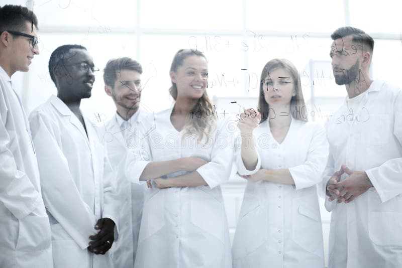 Thoughtful Scientists Look at Formulas Stock Photo - Image of ...