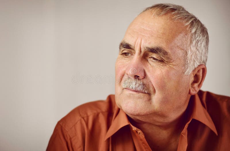 Thoughtful Senior Man Sitting Reminiscing Stock Photo - Image of wisdom ...