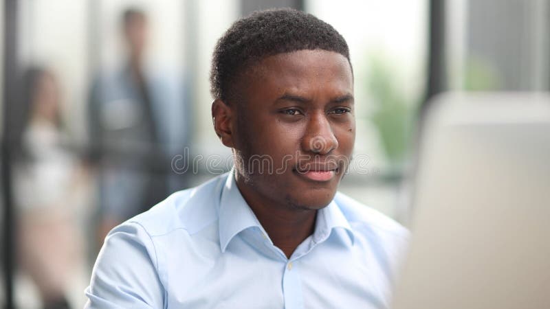 Thoughtful Serious African Man Sit with Laptop Thinking of Project ...