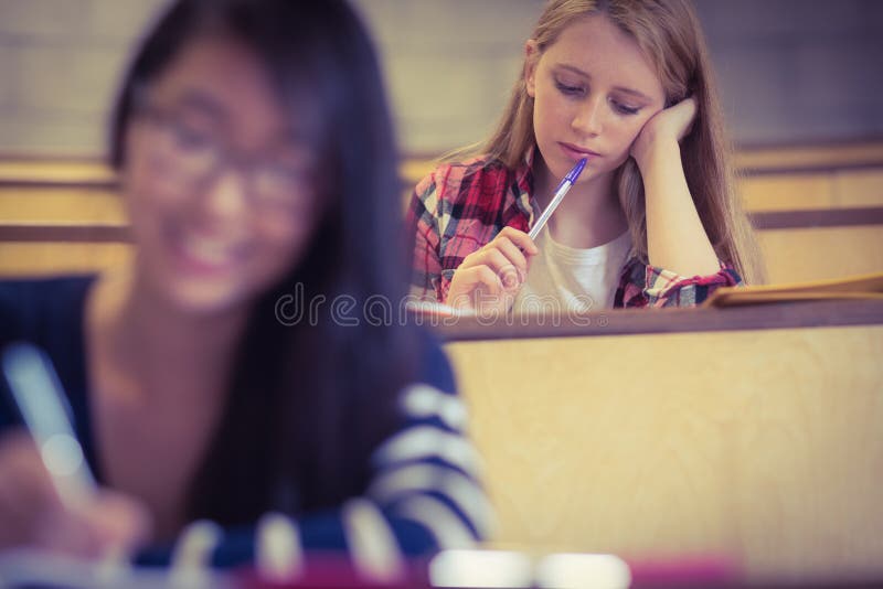 Thoughtful Student during Class Stock Photo - Image of caucasian, hall ...