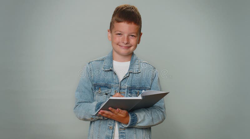 Thoughtful Toddler Kid Boy Making Notes Writing Down Thoughts in ...