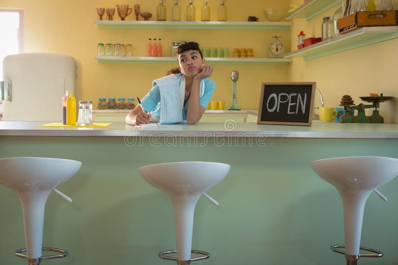 Waitress Standing at Counter in Restaurant Stock Photo - Image of ...